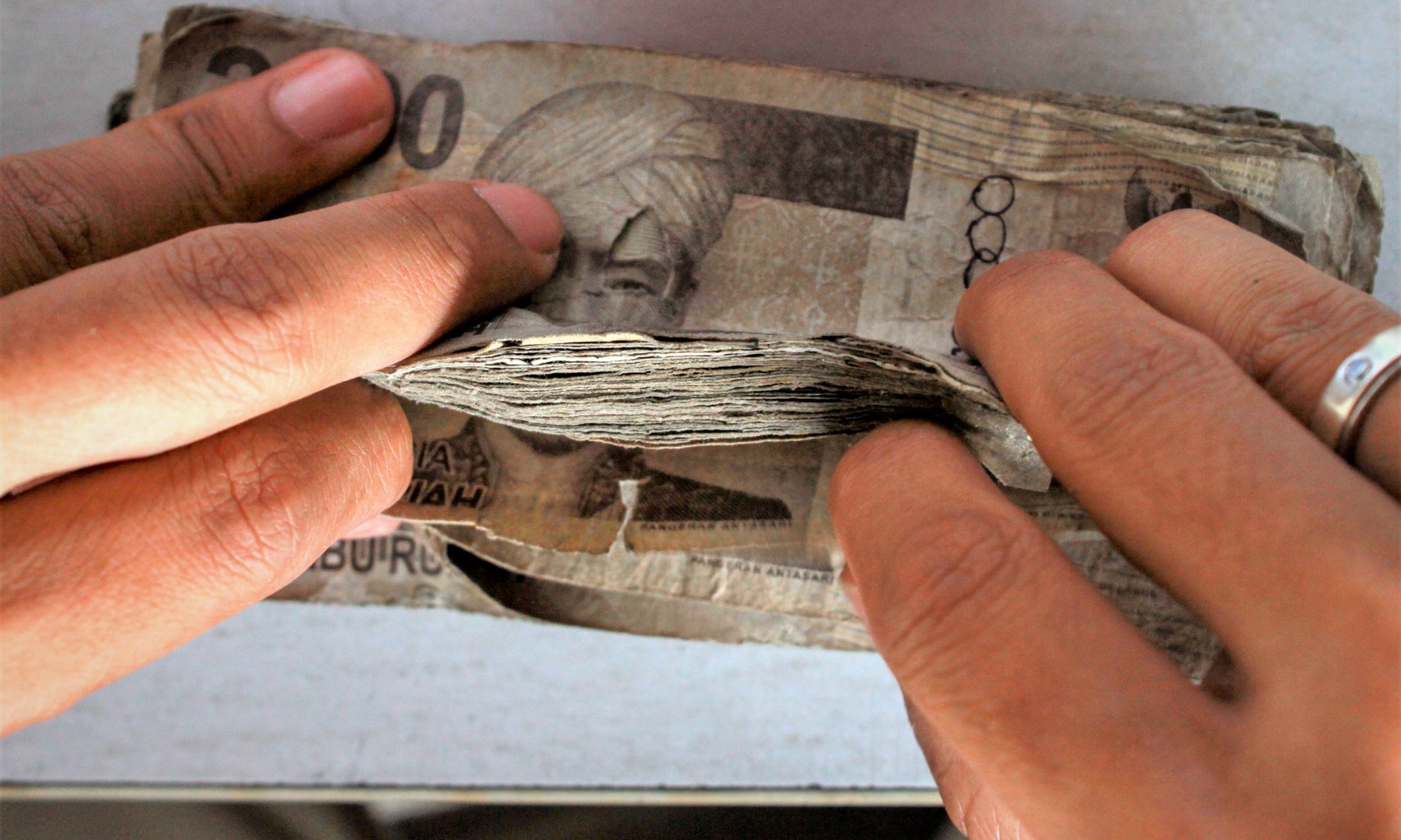 Mulai Besok, Penukaran Uang Rusak Bisa Dipesan Lewat PINTAR